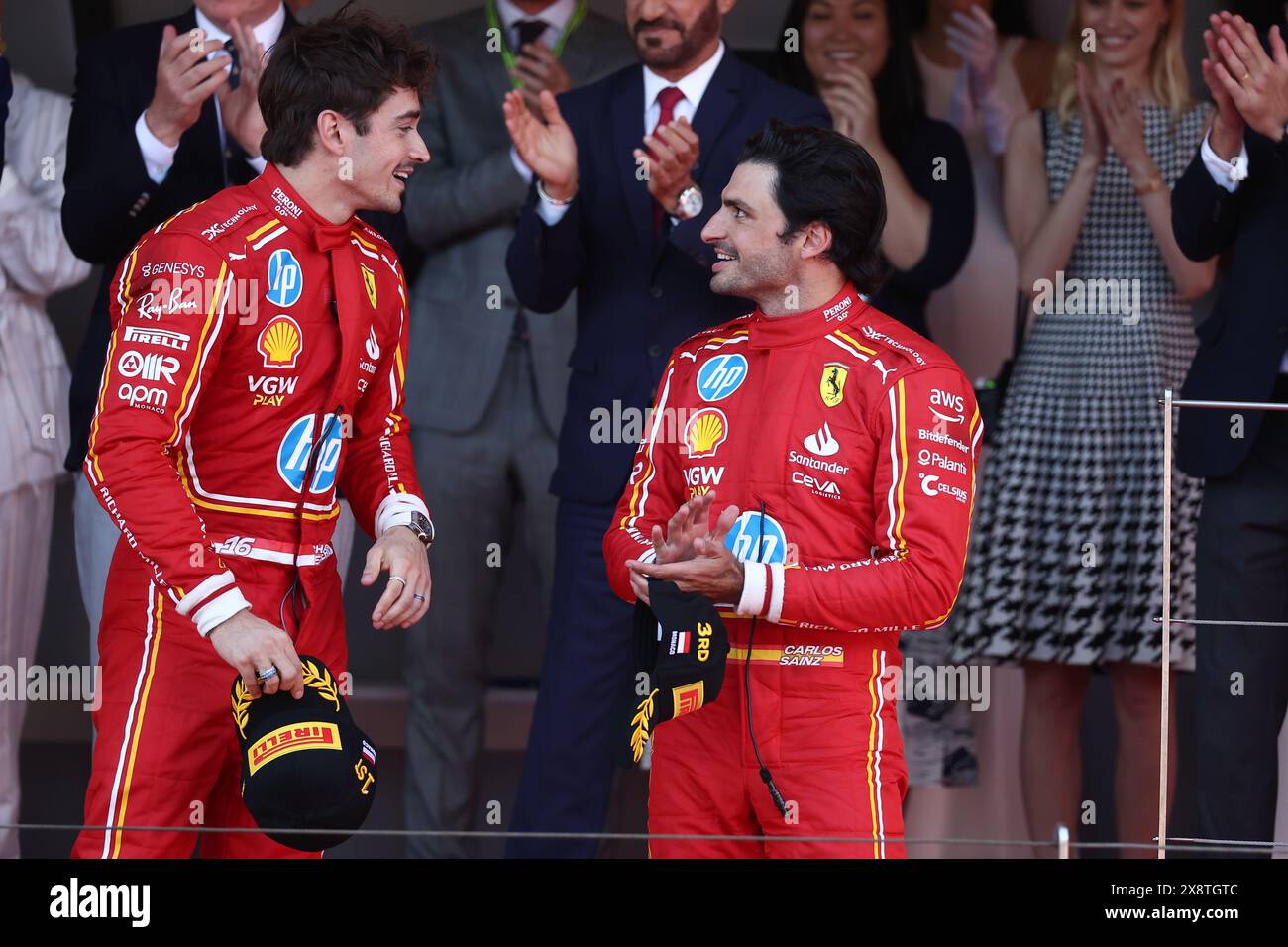 Charles Leclerc (L) and Carlos Sainz (R) of Scuderia Ferrari celebrate ...