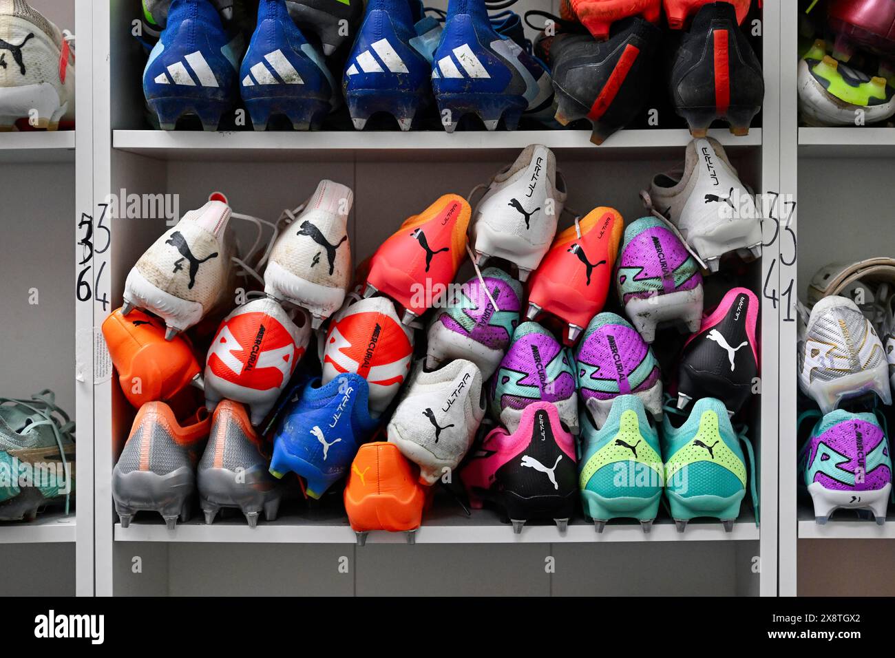 Football coloured football boots Stock Photo - Alamy