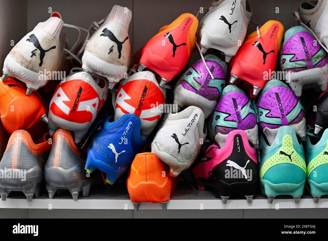 Football coloured football boots Stock Photo - Alamy