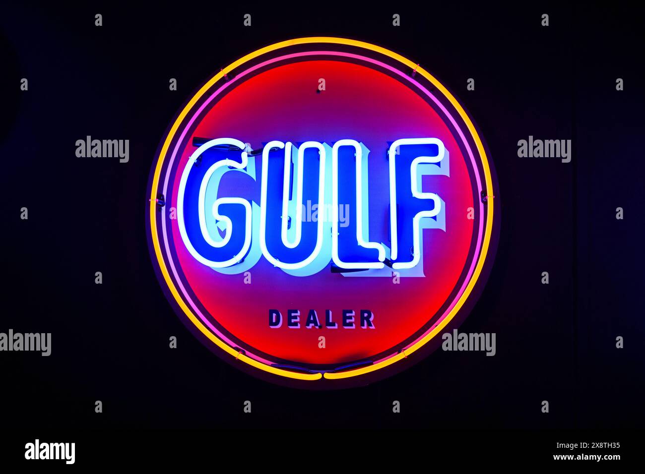 Illuminated advertising Gulf Dealer Stock Photo - Alamy