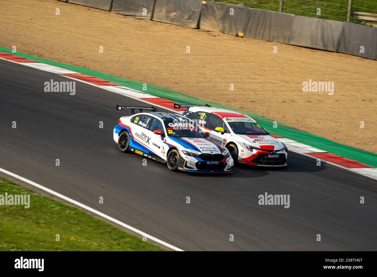 Adam Morgan 33 Team BMW over takes Rob Huff 12 Toyota Gazoo Racing ...