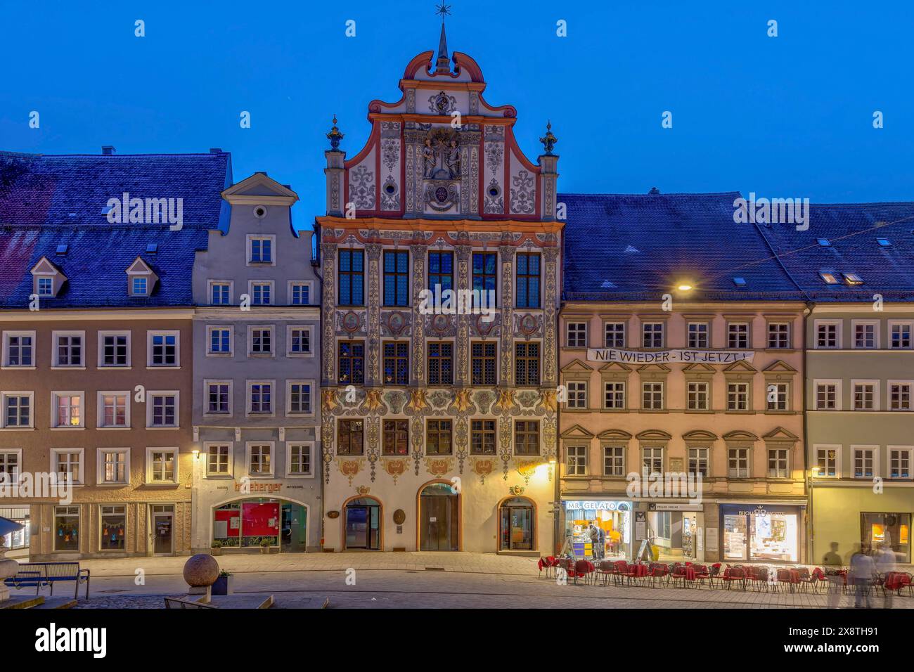 The medieval historic town hall decorated with reliefs and figures on ...