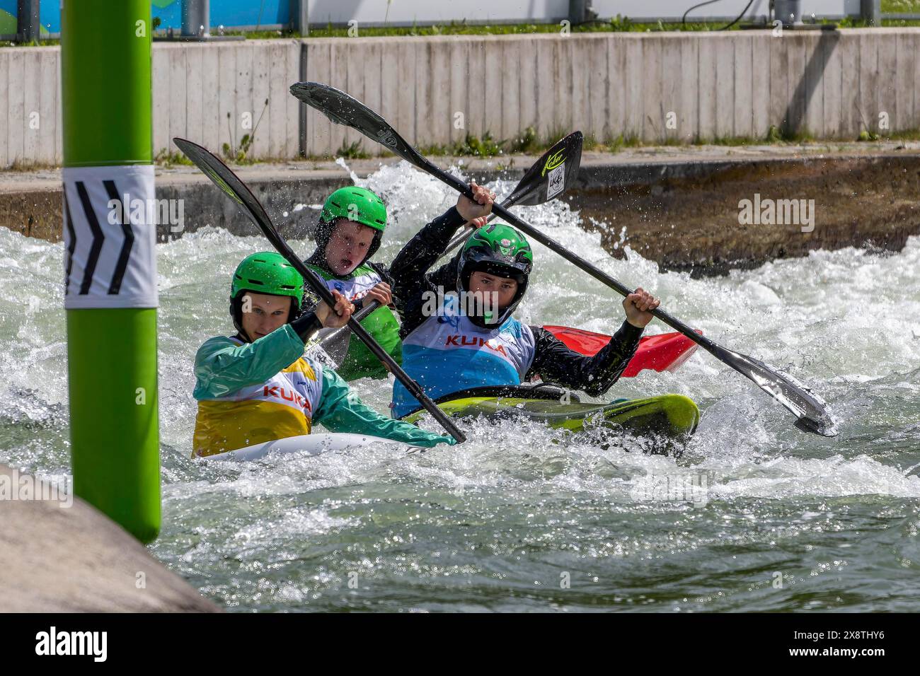 Kayak competition on the Augsburg ice canal with kayak paddlers, kayak ...