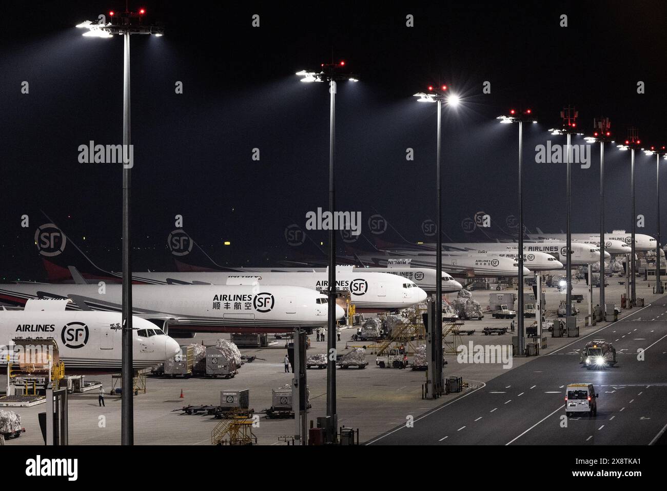 General view of dozens of SF cargo aircrafts line up to be loaded at ...