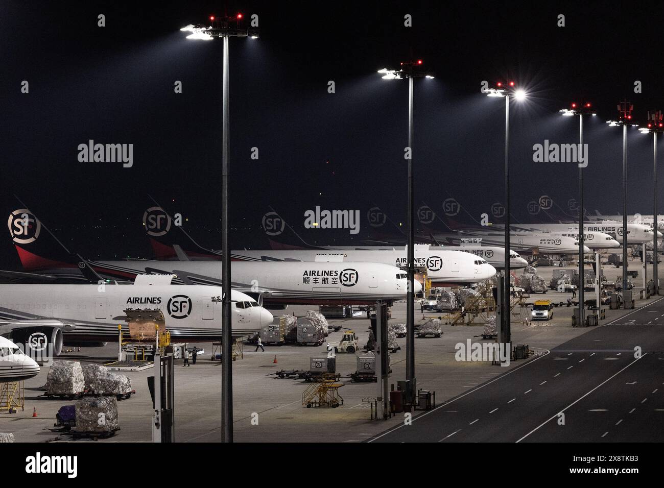 General view of dozens of SF cargo aircrafts line up to be loaded at ...