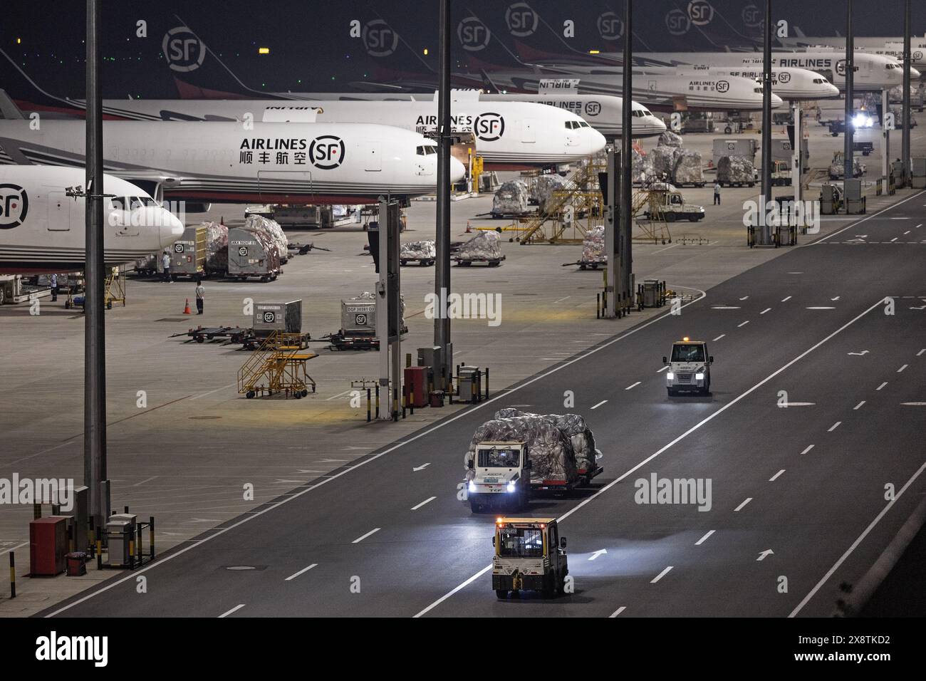 General view of dozens of SF cargo aircrafts line up to be loaded at ...