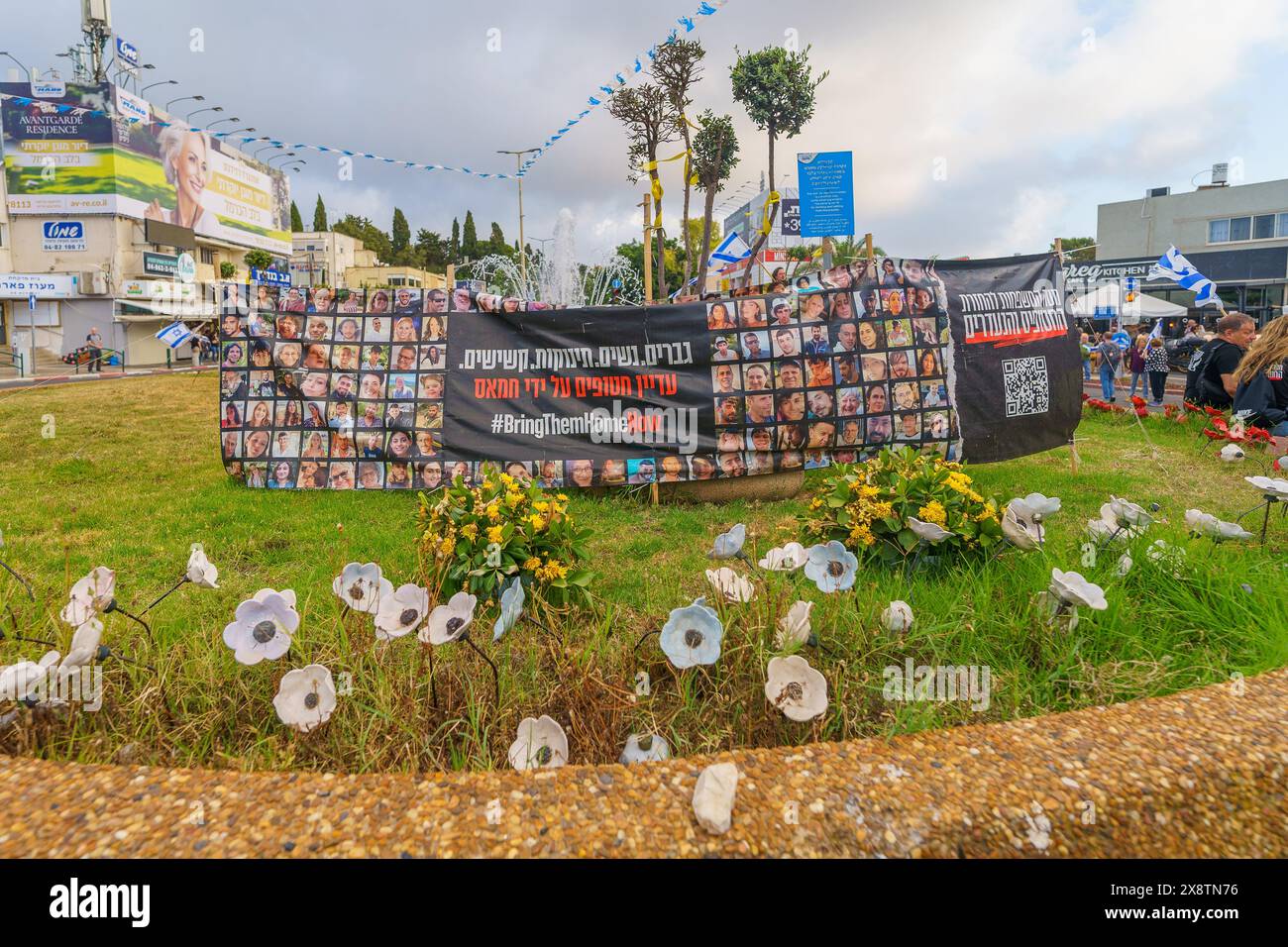 Haifa, Israel - May 25, 2024: Display with symbolic flowers, as a ...