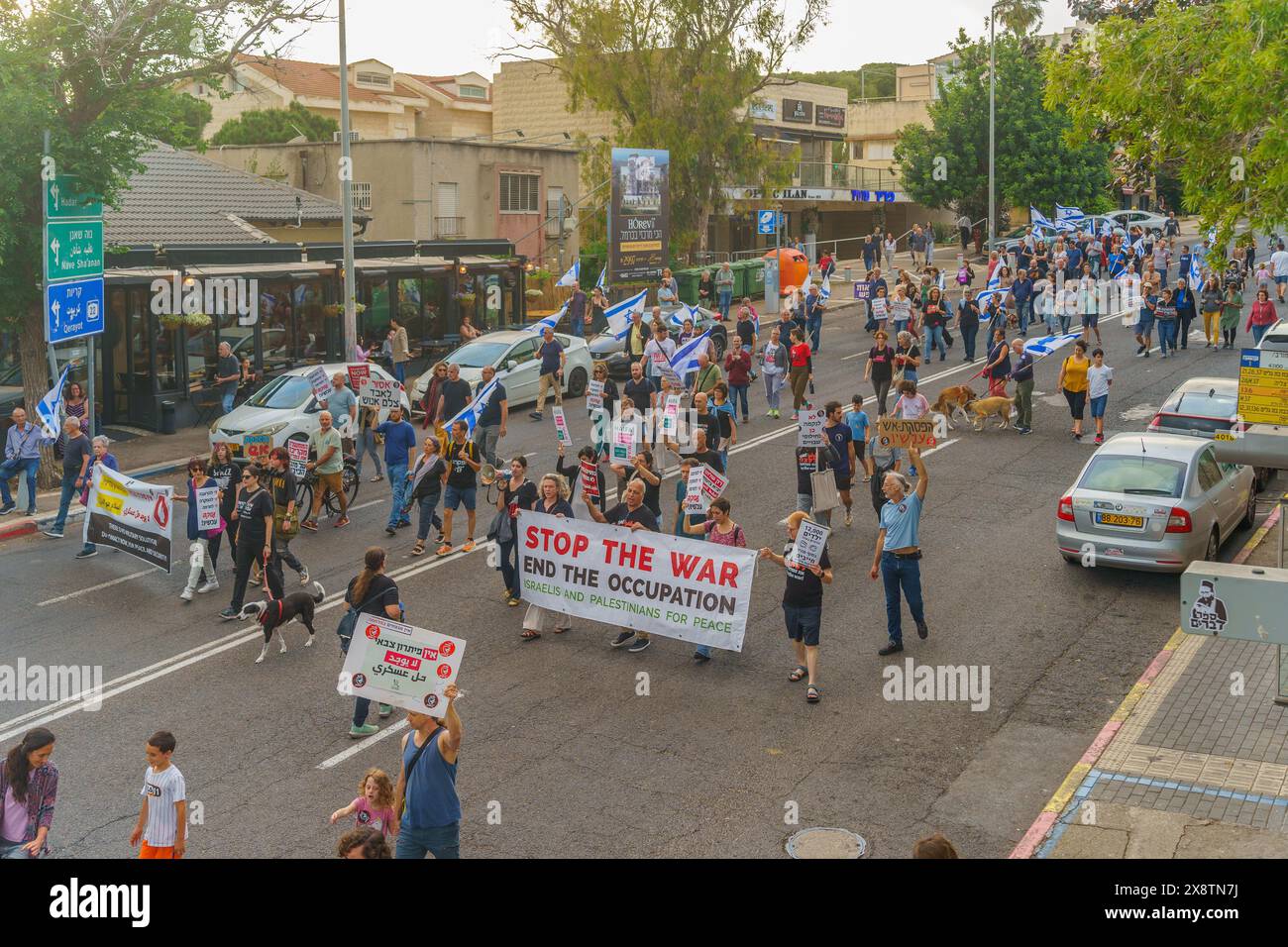 Haifa, Israel - May 25, 2024: People with signs calling for peace talk ...