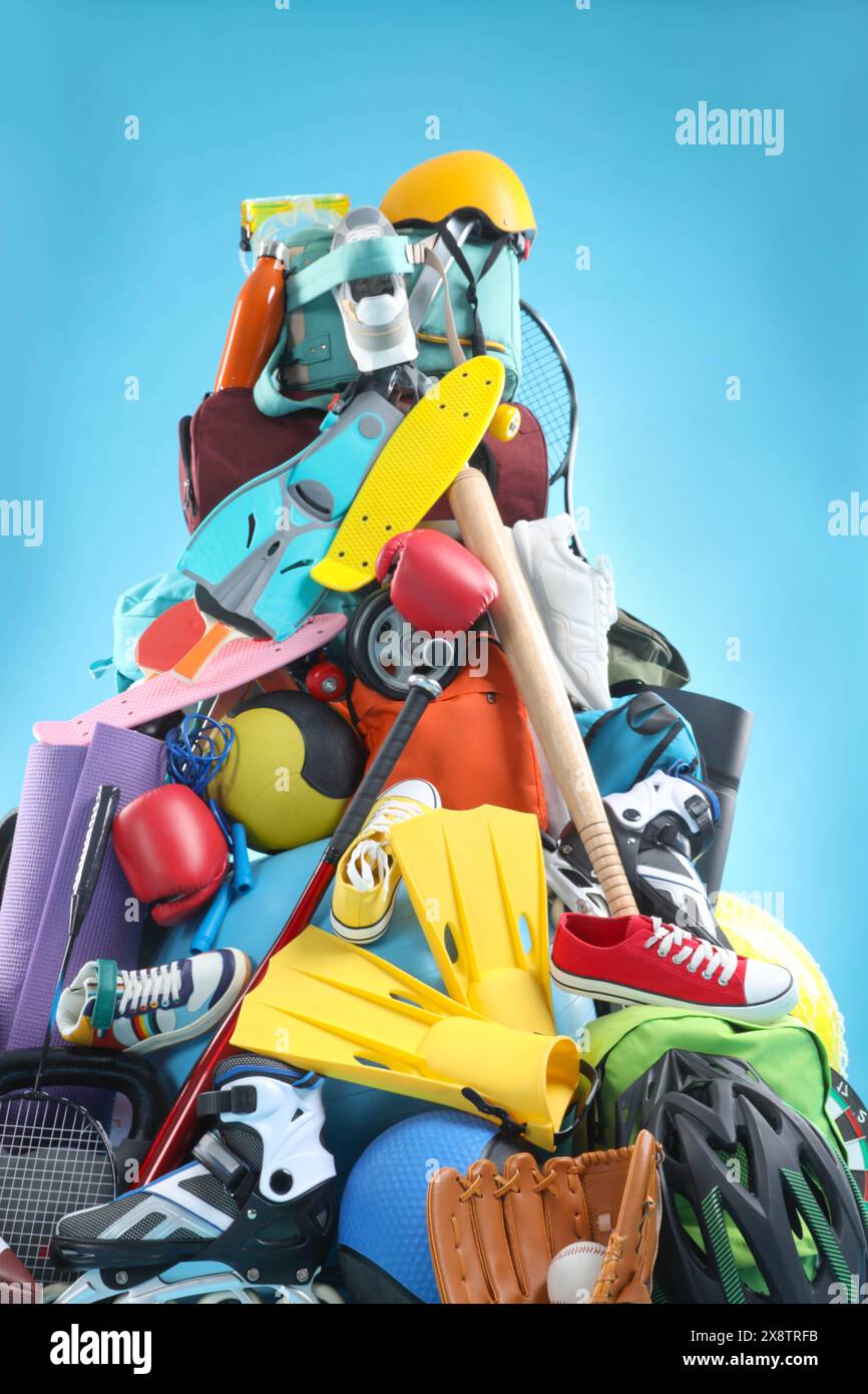 Many different sports equipment on light blue background Stock Photo ...