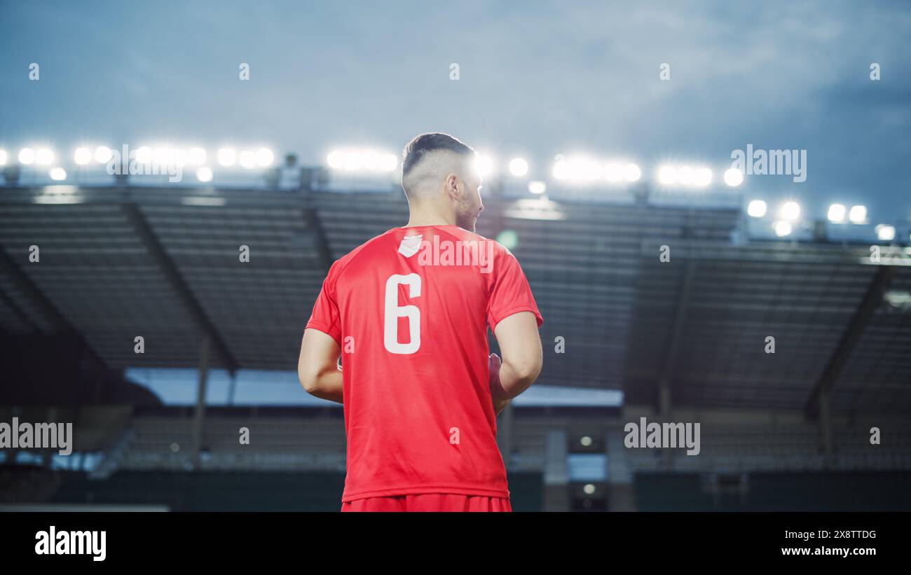 Footballer back holding ball hi-res stock photography and images - Alamy