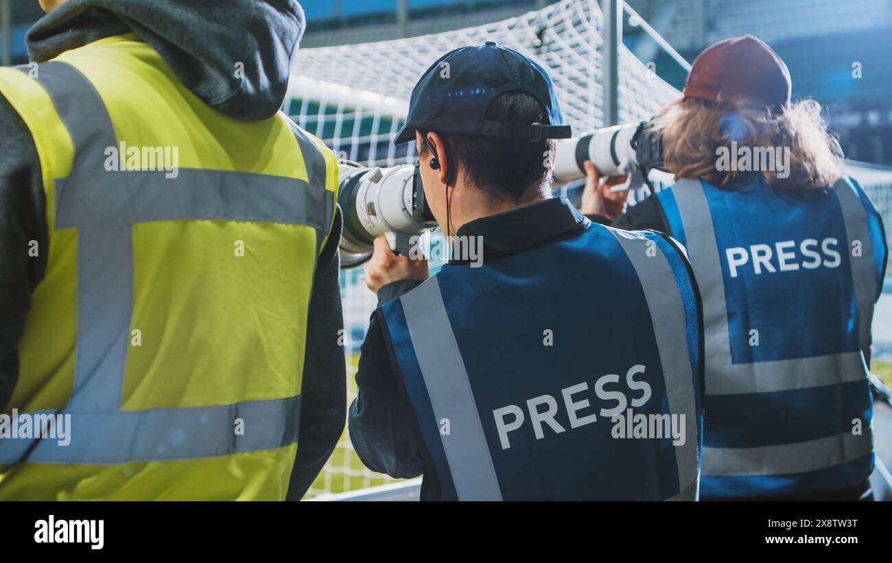 Professional Press Officer, Sports Photographers with Camera Zoom Lens ...