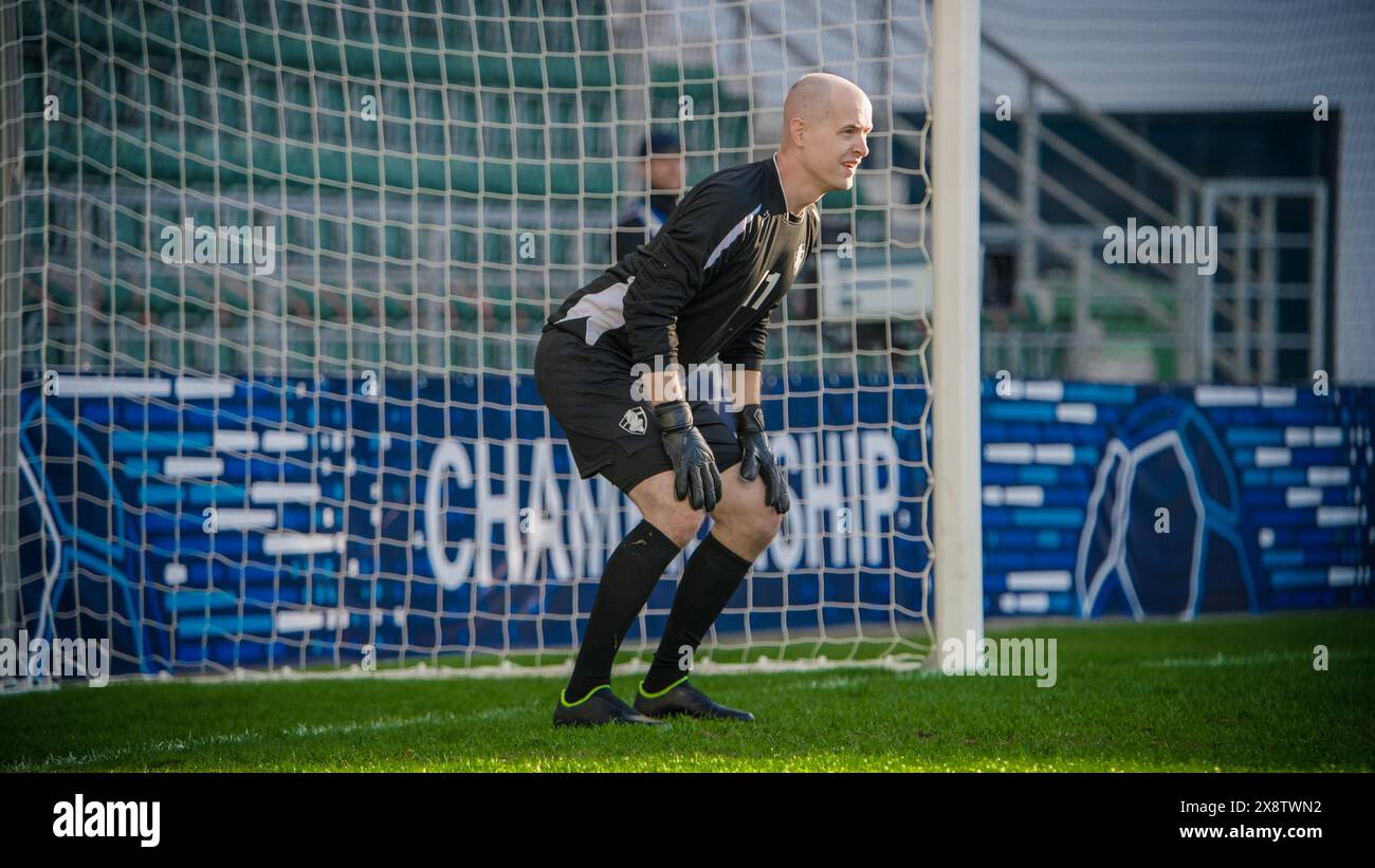 Football player stadium hitting ball hi-res stock photography and ...