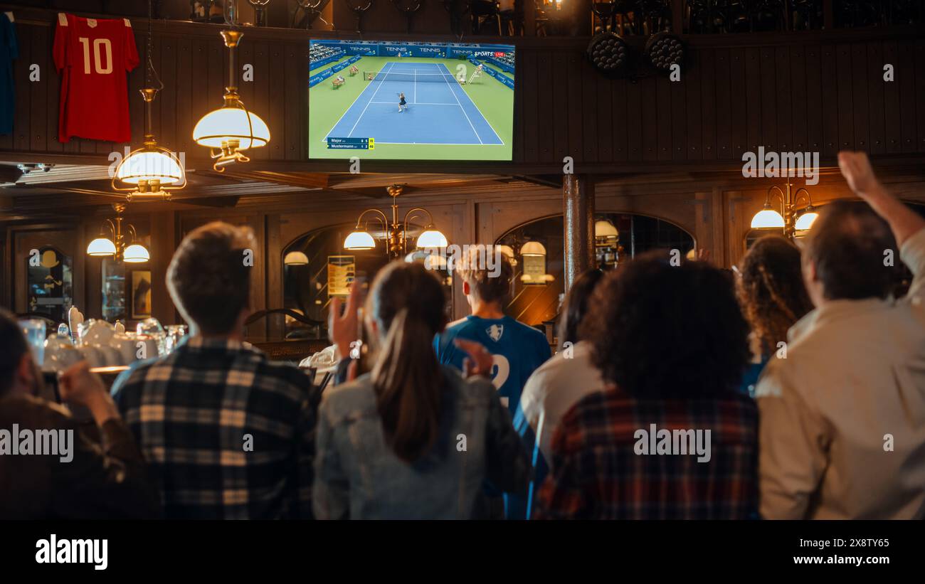 Group of Tennis Fans Watching a Live International Broadcast in a ...
