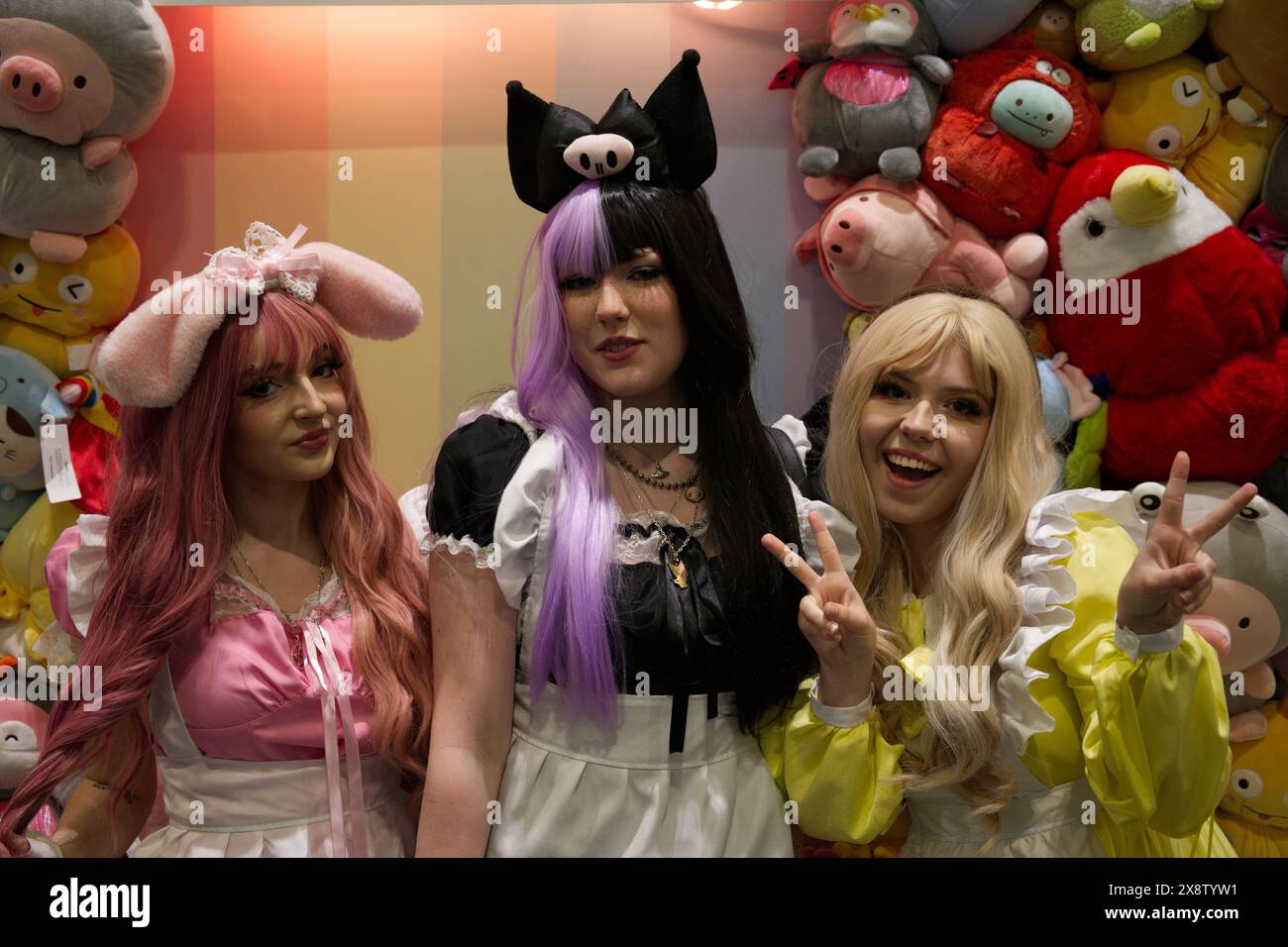 Three female cosplayers at Comic Con London Stock Photo - Alamy