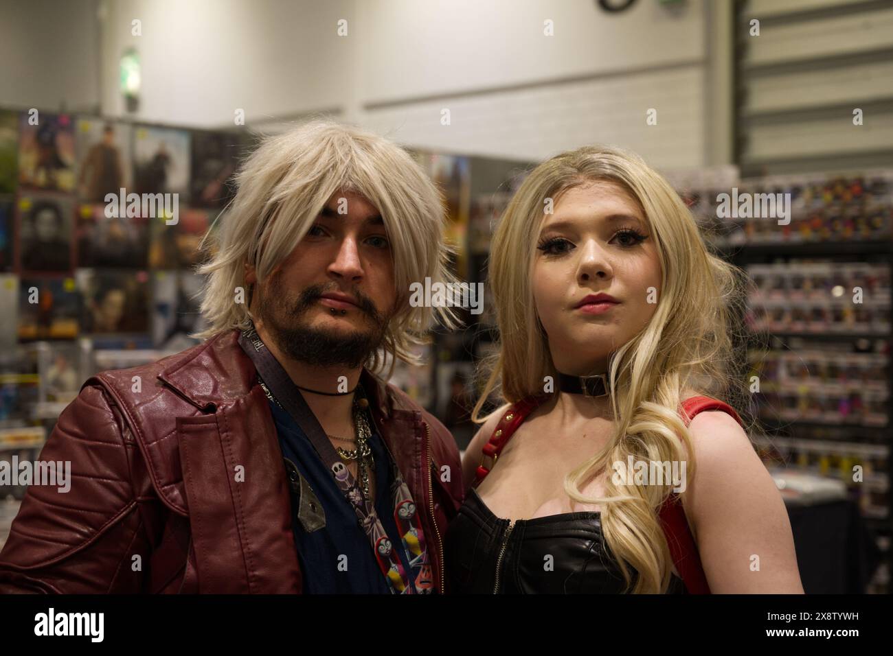 a couple cosplay at Comic Con London Stock Photo - Alamy