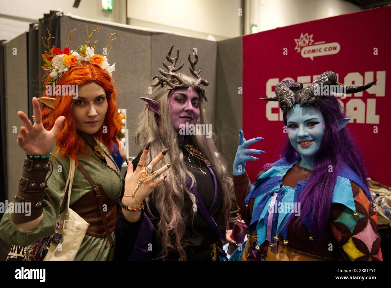 Three female cosplayers at Comic Con London Stock Photo - Alamy