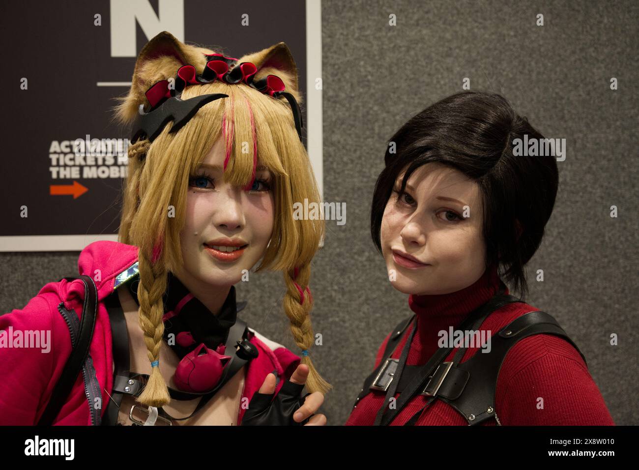 Two female cosplayers at Comic Con London Stock Photo - Alamy