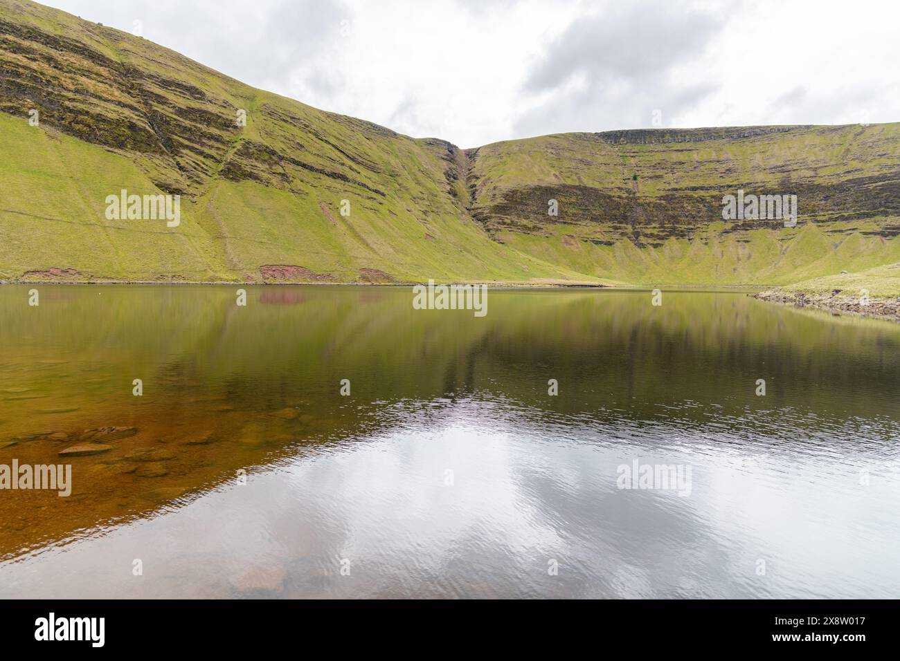 View of Llyn y Fan Fach glacial lake at the peak of Picws Du mountain ...