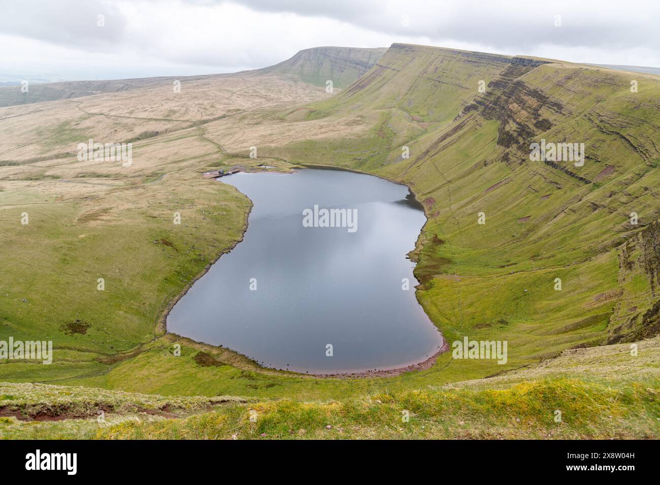 View of Llyn y Fan Fach glacial lake at the peak of Picws Du mountain ...