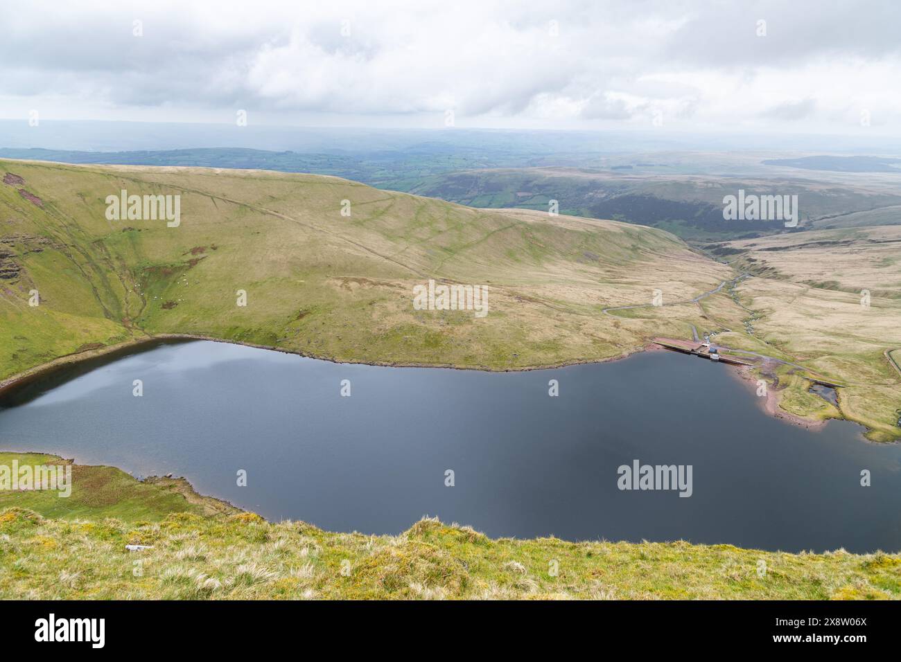 View of Llyn y Fan Fach glacial lake at the peak of Picws Du mountain ...