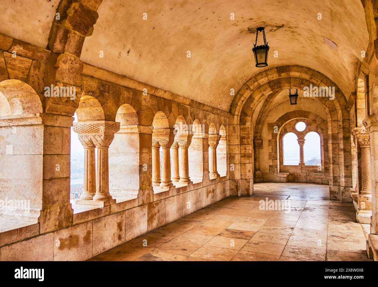 Arched gallery of stone Fisherman's Bastion with scenic windowframes ...