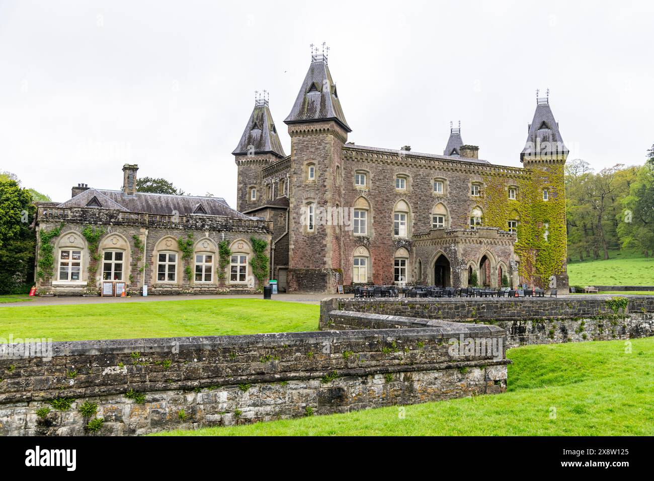 The front view of the entrance outside Newton House in Dinefwr Park in ...