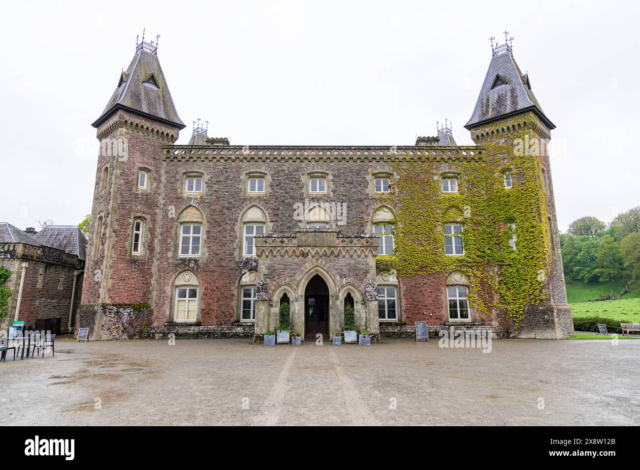 The front view of the entrance outside Newton House in Dinefwr Park in ...