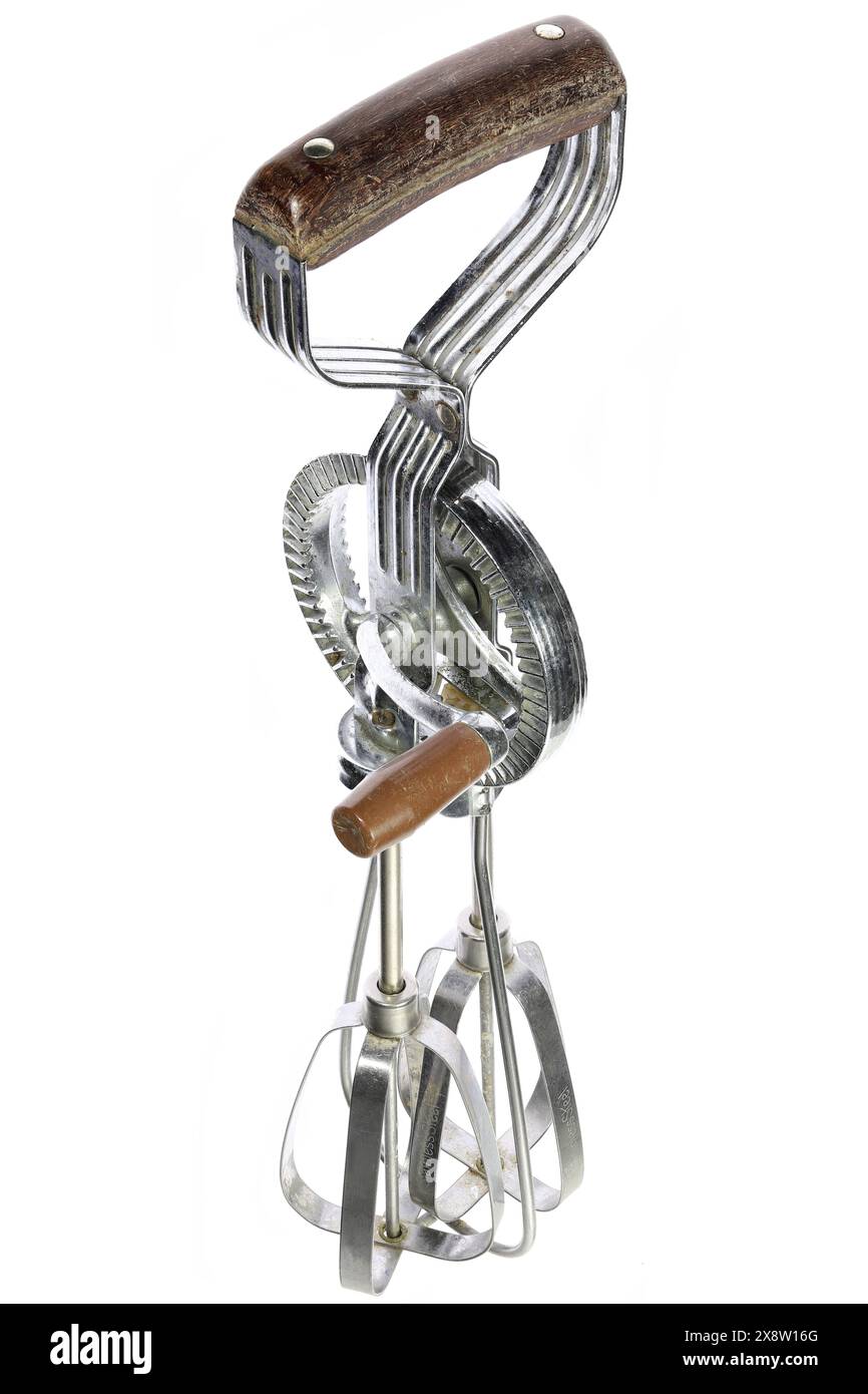 vintage rotary whisk isolated on white background Stock Photo - Alamy