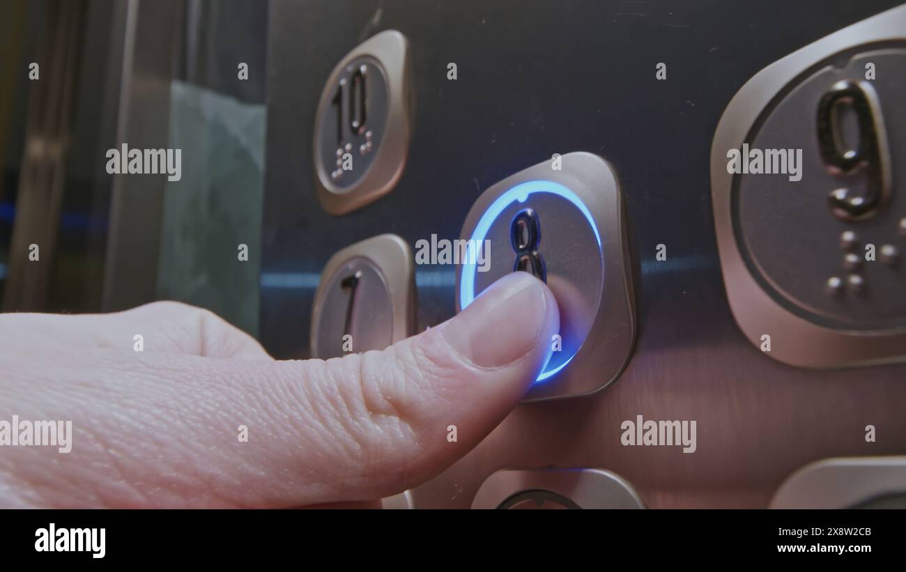 Close up of man pressing elevator button of the eight floor. Stock clip ...