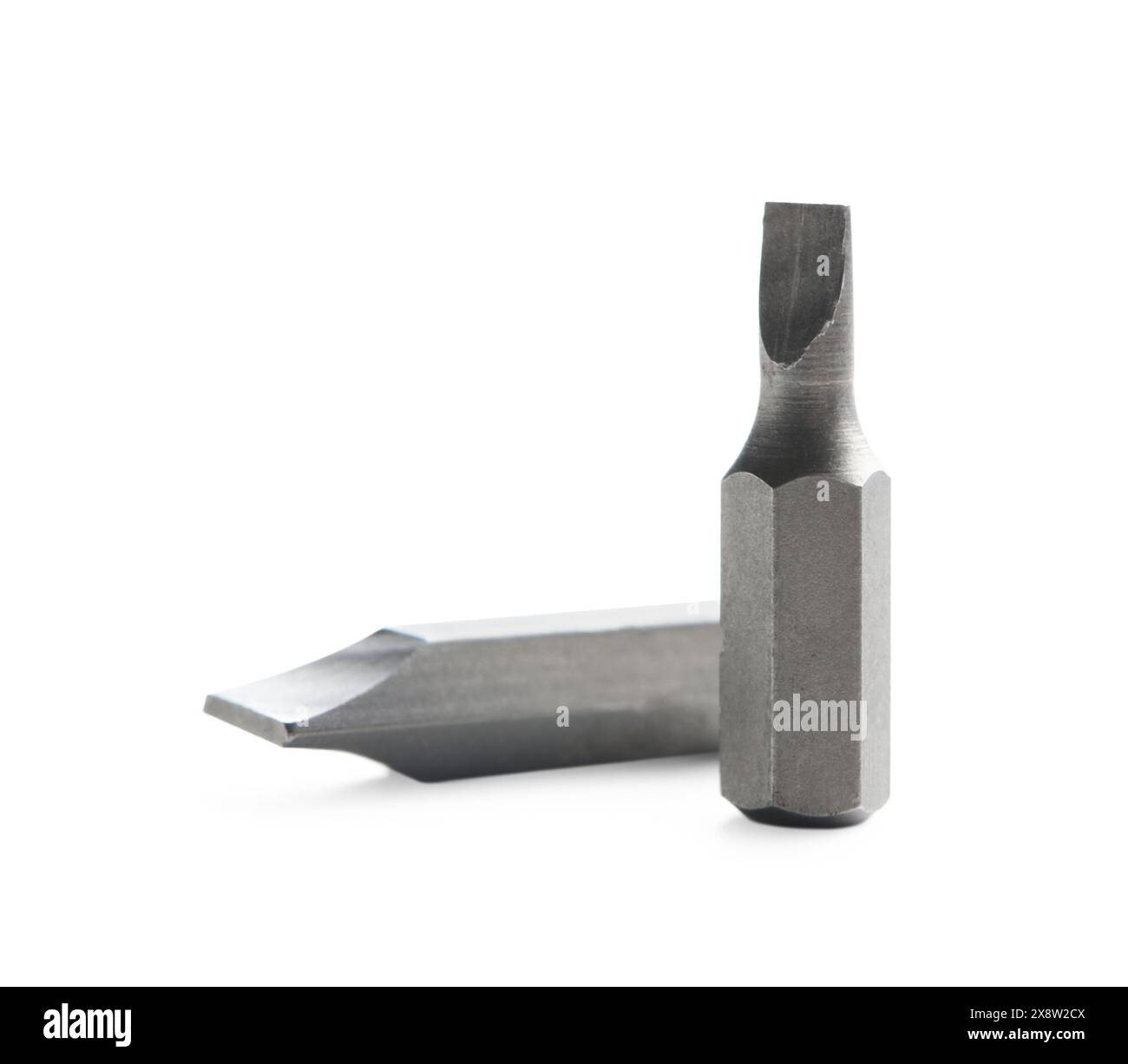 Two flathead screwdriver bits on white background Stock Photo - Alamy