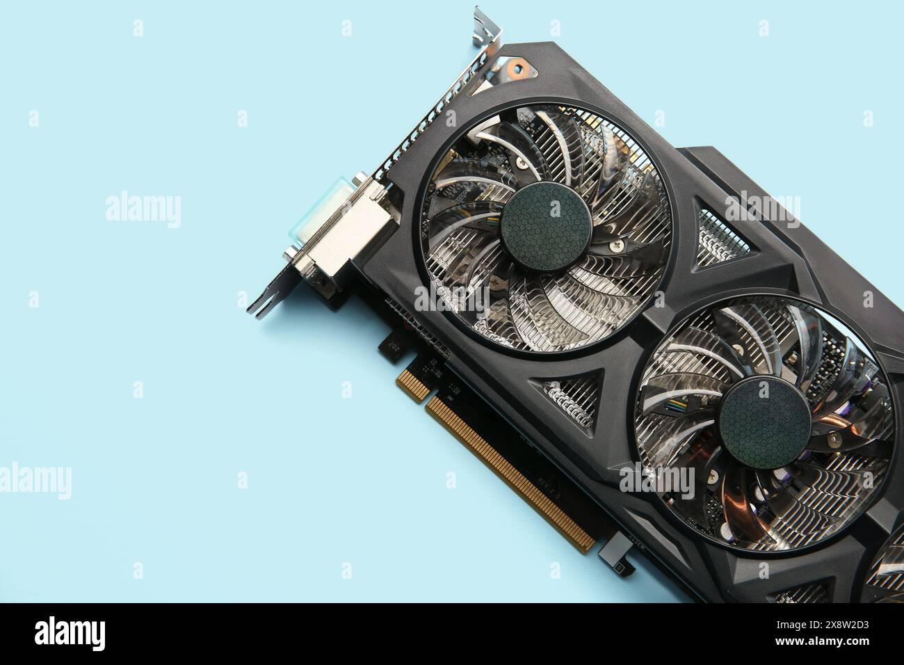 One graphics card on light blue background, top view. Space for text ...