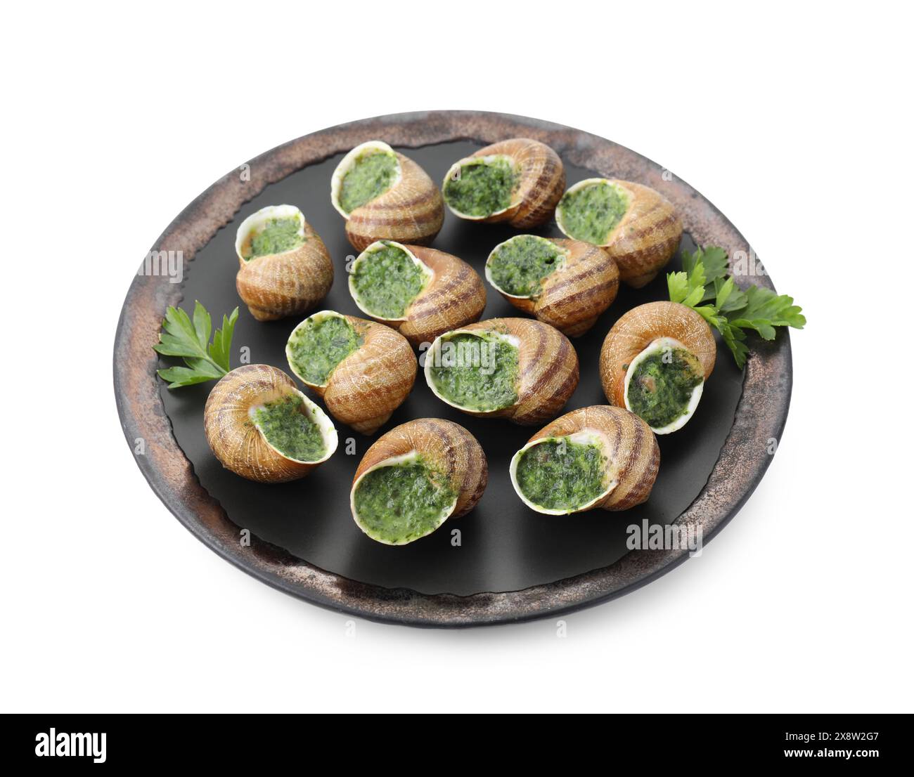 Delicious cooked snails with parsley isolated on white Stock Photo - Alamy