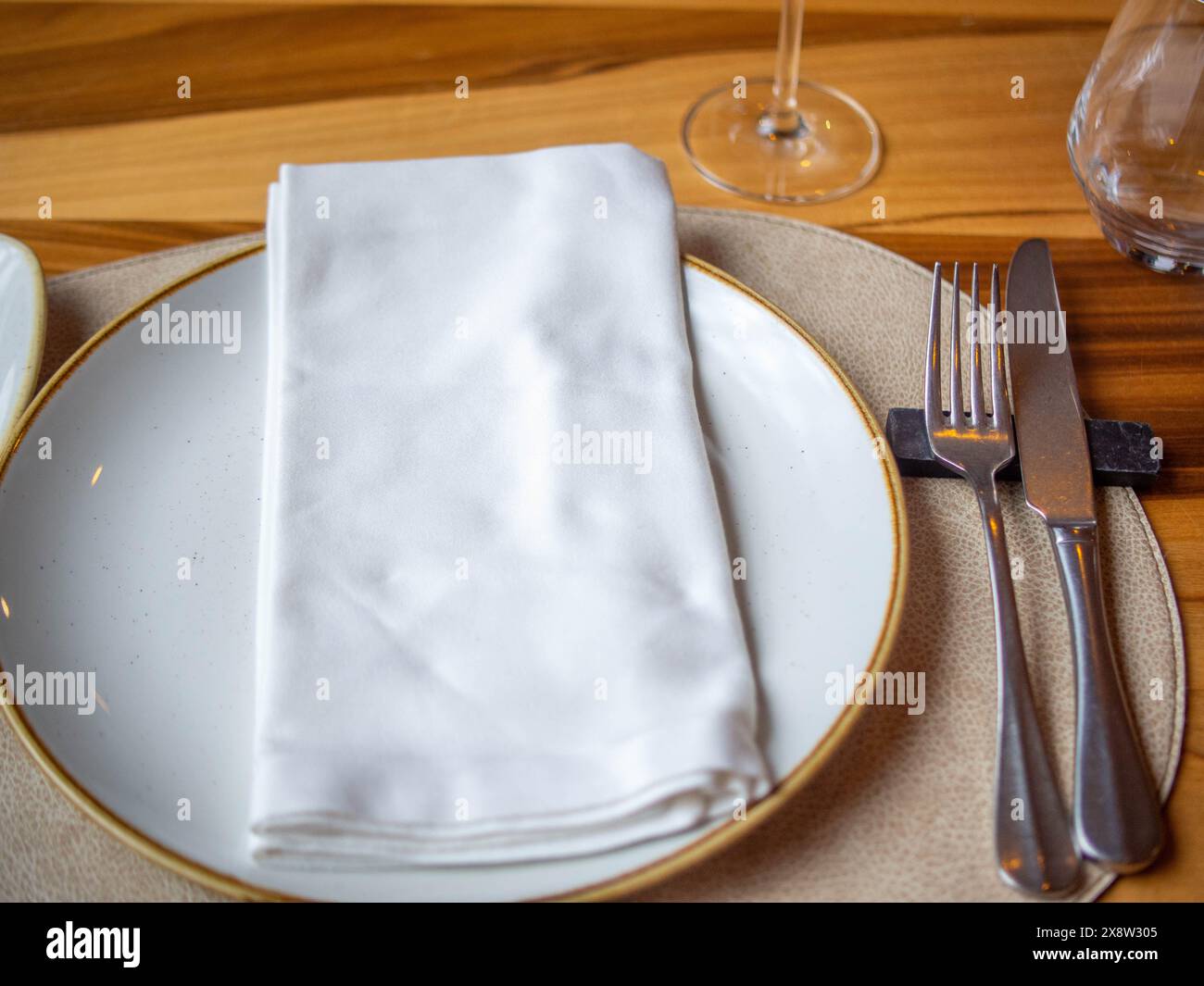 An elegantly set table for a meal or dinner Stock Photo - Alamy