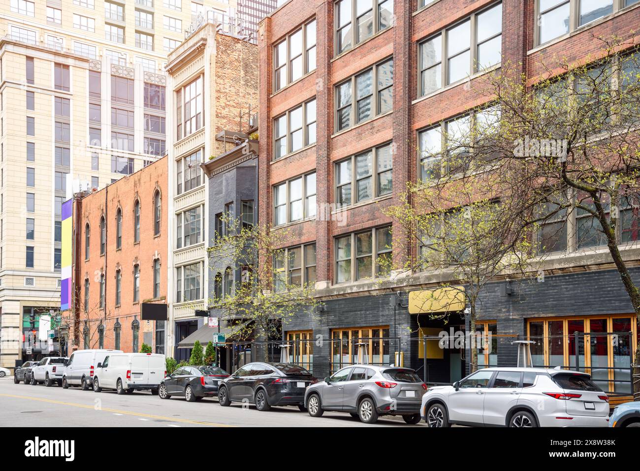 Row of Renovated traditional brick buildings with shops and restaurants ...