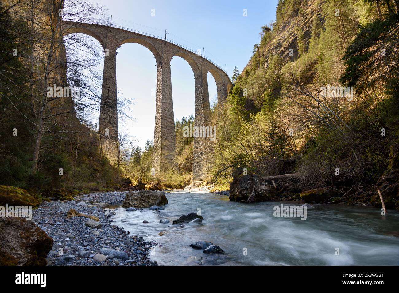 Low Angle view of Landwasser railway viaduct in the Swiss Alps on a ...