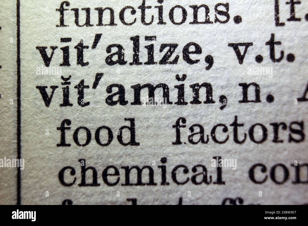 Word vitamin on dictionary page, macro close-up Stock Photo - Alamy