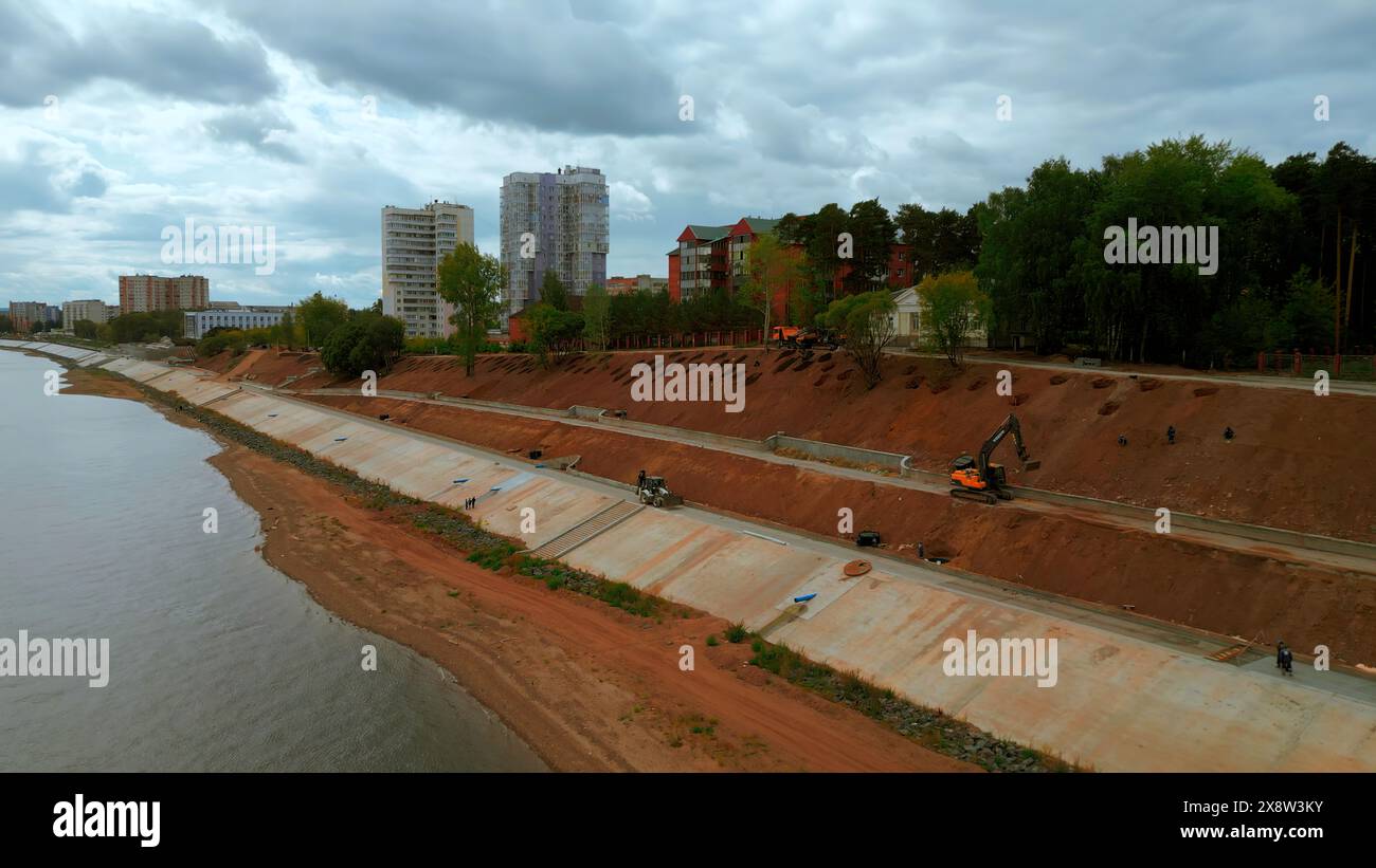 Construction and strengthening of a new safety embankment along the ...