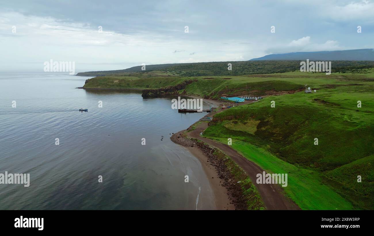 Aerial view of the small river port. Clip. Beautiful valley and big ...