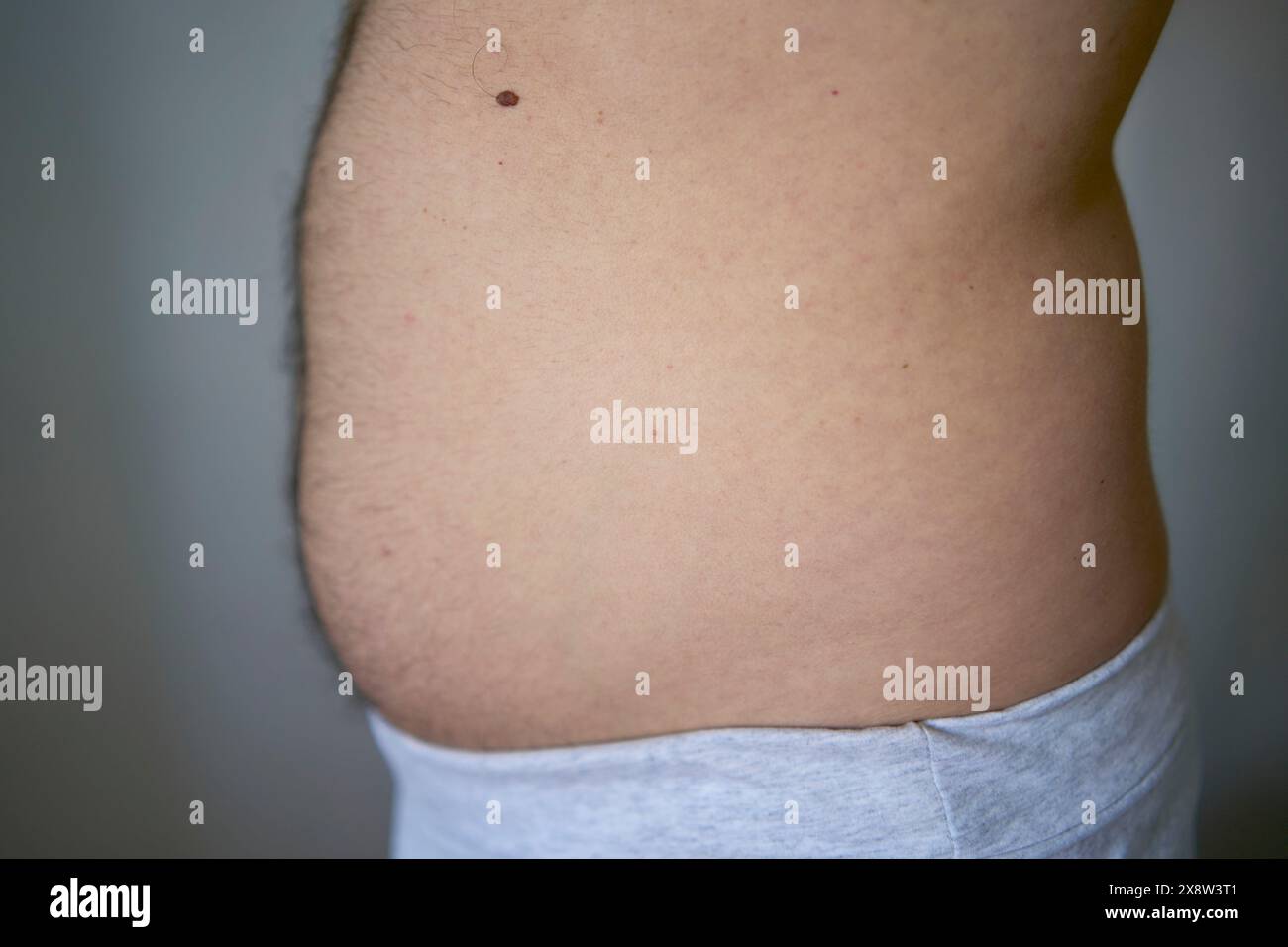 side and stomach of a thirty-year-old man of average build Stock Photo ...