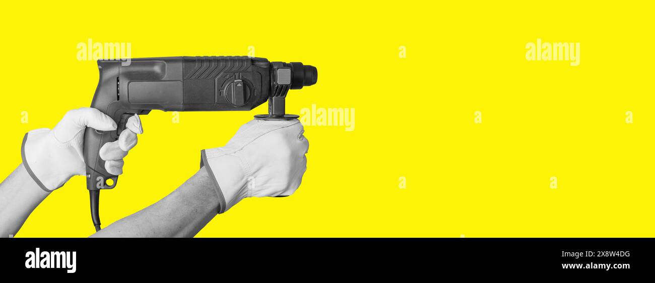 Power drill and driller tool. Hand with electric perforator and glove ...