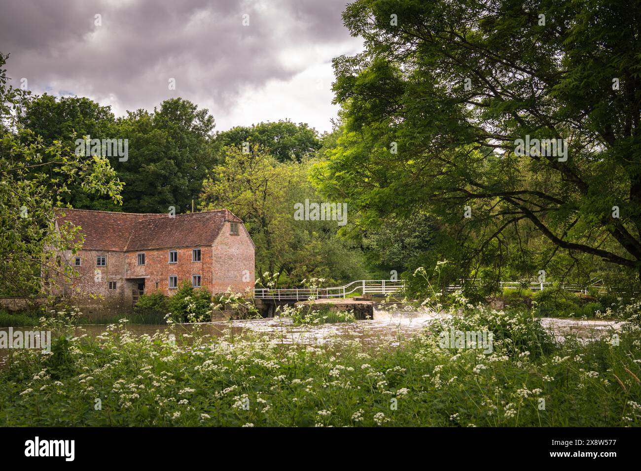 A summer HDR image of the 16th century, still working, Sturminster Mill ...