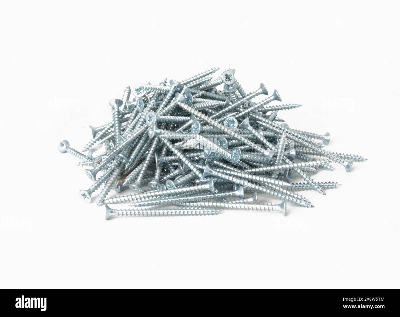 bunch of metal screws isolated on white background. High quality photo ...