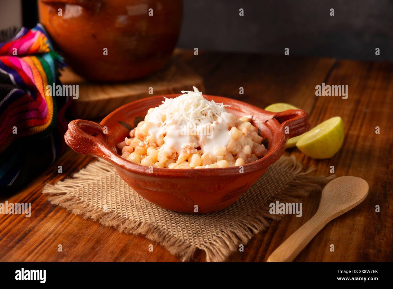 Esquites. Corn kernels cooked and served with mayo, sour cream, lemon ...