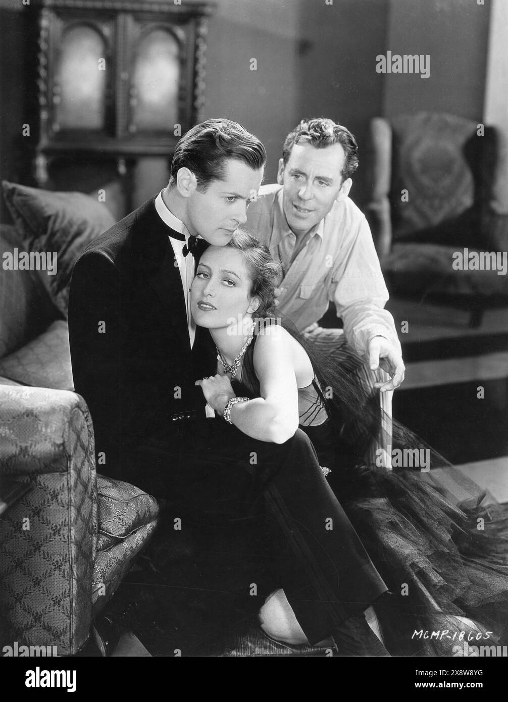 ROBERT MONTGOMERY and JOAN CRAWFORD with director JACK CONWAY on the set of UNTAMED 1929 Story ...