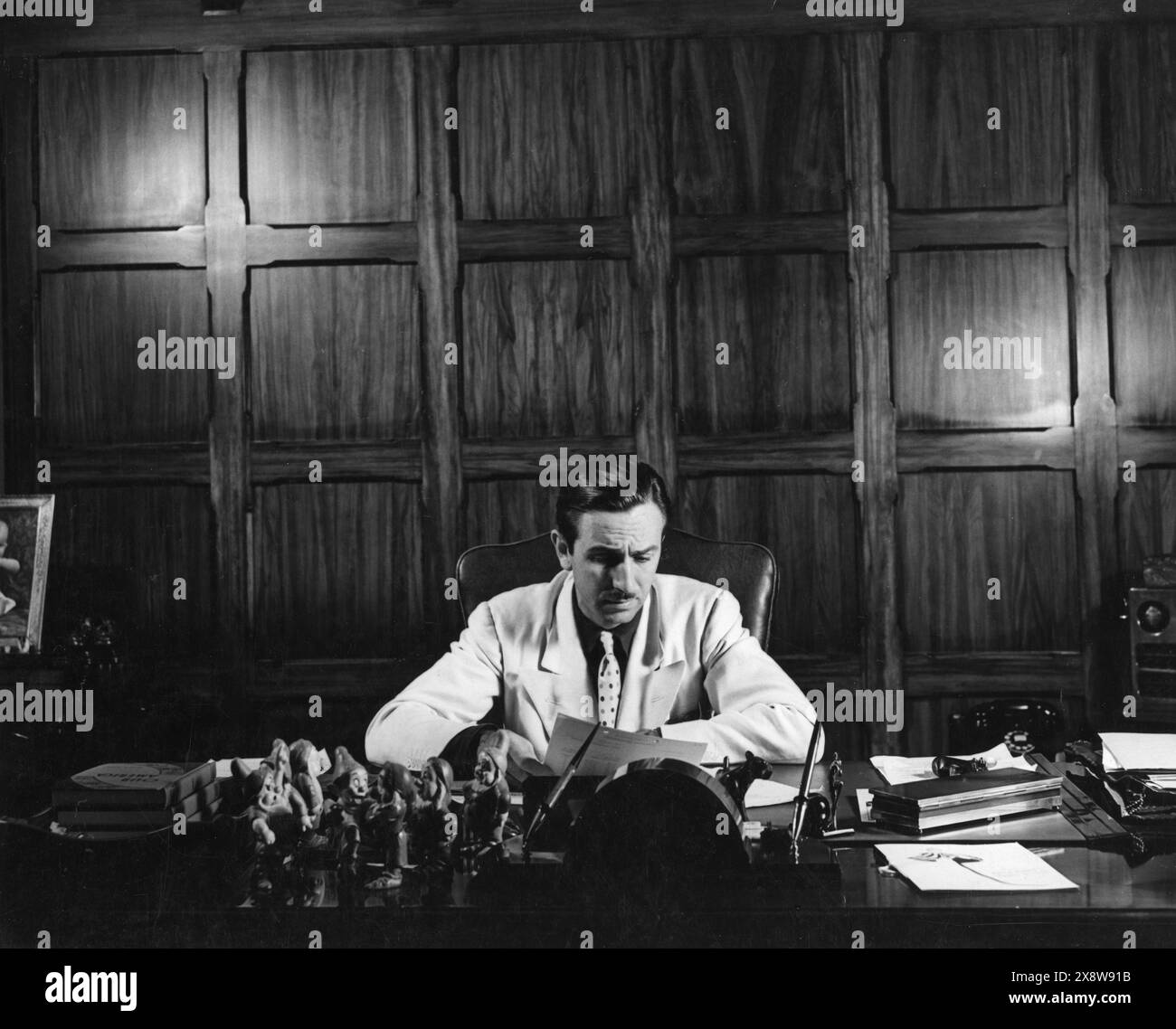 WALT DISNEY in his wood-paneled office circa 1937 Walt Disney ...
