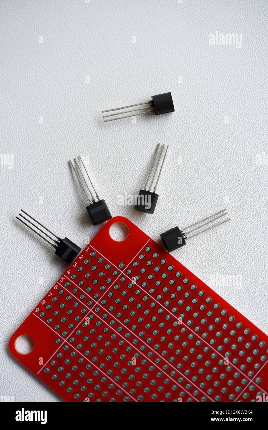 Red printed circuit board and chips and radio components. Capacitors ...