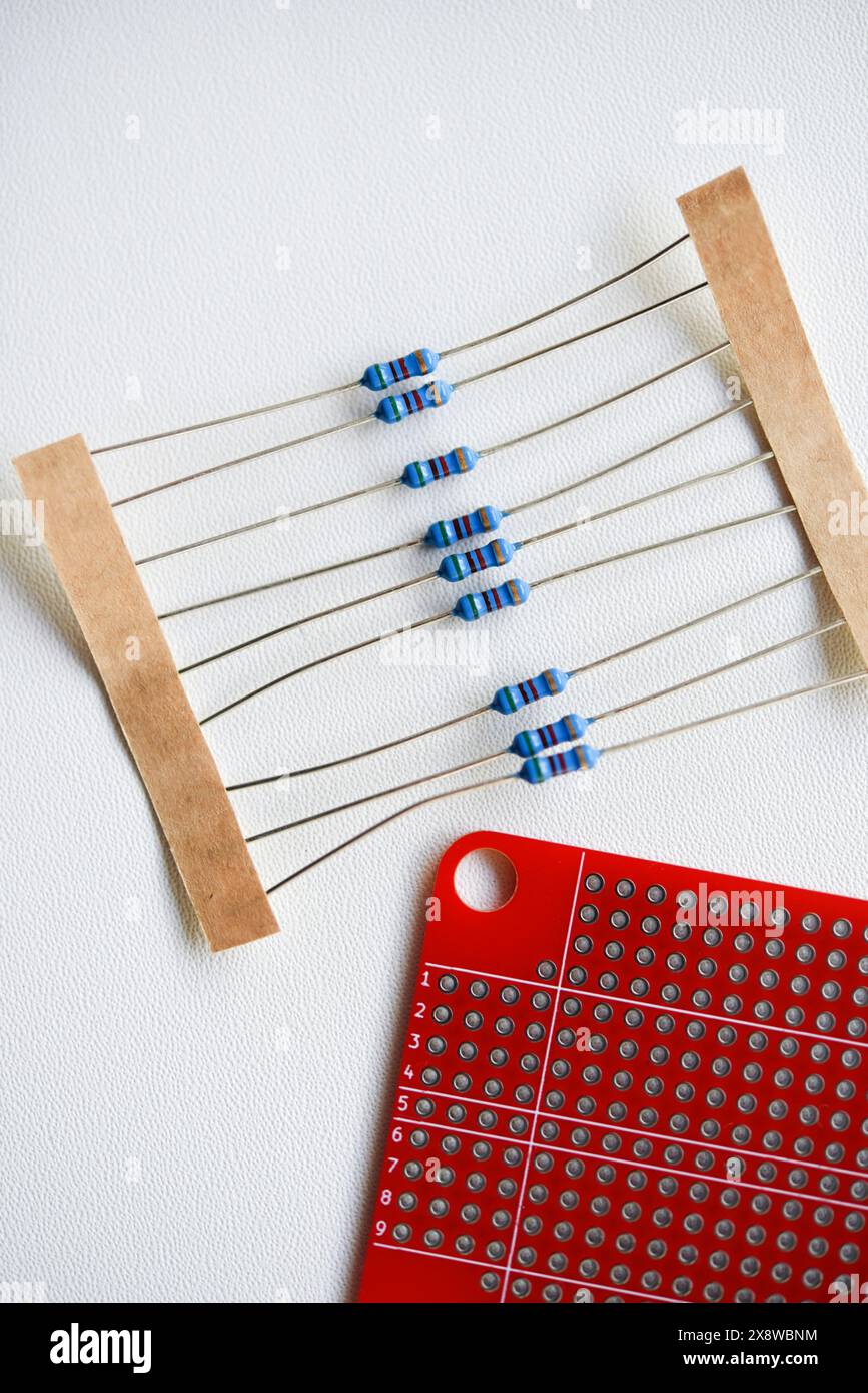 Red printed circuit board and chips and radio components. Capacitors ...
