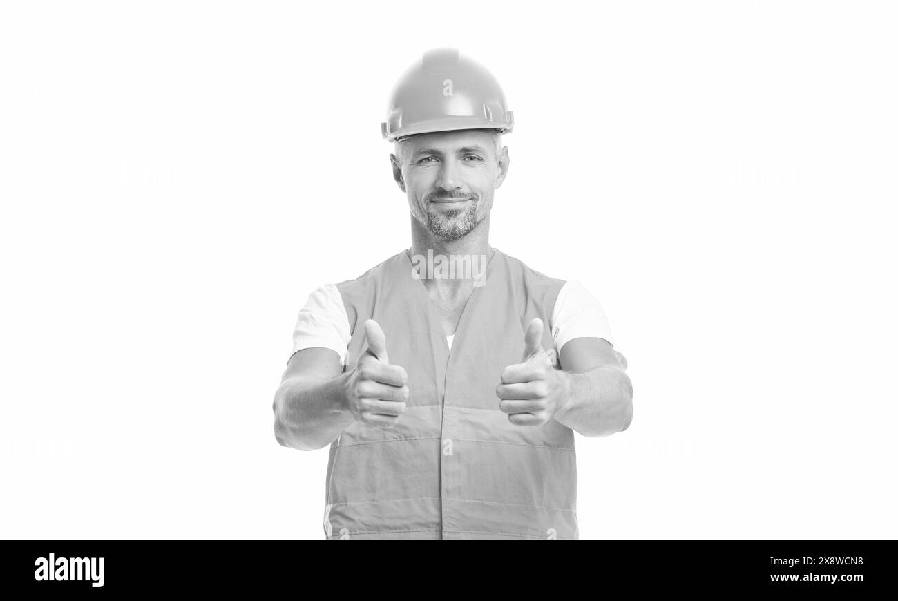 man engineer in white studio, thumb up. man engineer on background ...