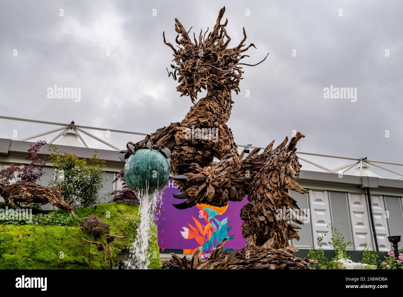 Large dragon statue on display at the 2024 RHS Chelsea flower show ...