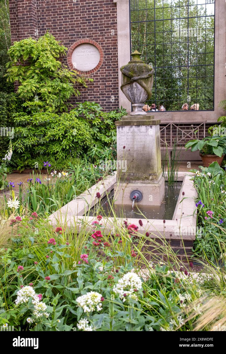 Ornate fountain and water feature in a display garden at the 2024 RHS ...